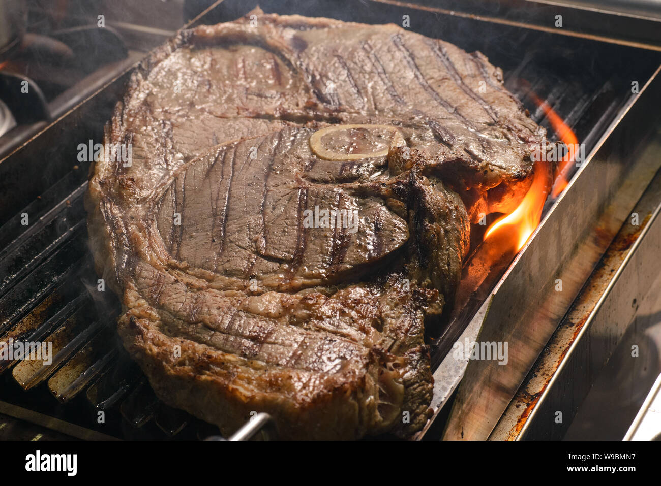 meat on fire Stock Photo - Alamy
