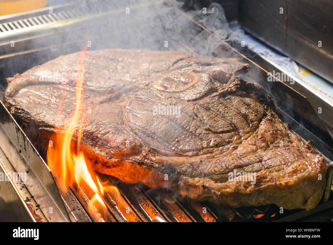 Bbq cook fire hi-res stock photography and images - Alamy