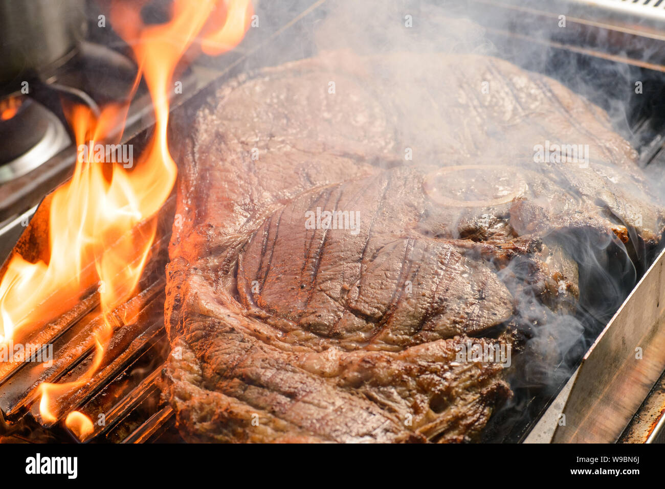 meat on fire Stock Photo - Alamy