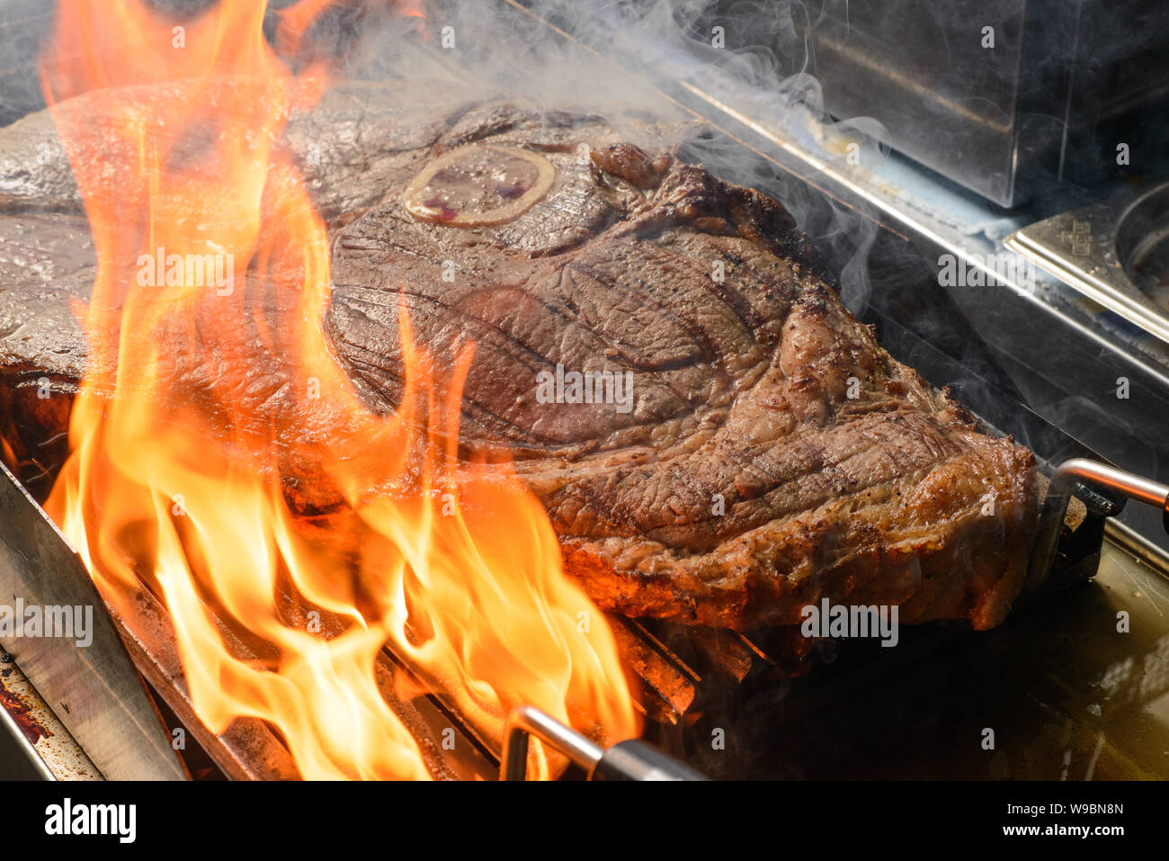 meat on fire Stock Photo - Alamy