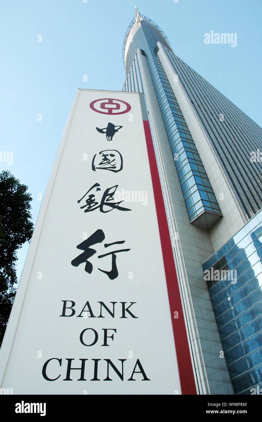 --FILE--A signboard of Bank of China (BOC) is seen in front of the Bank ...