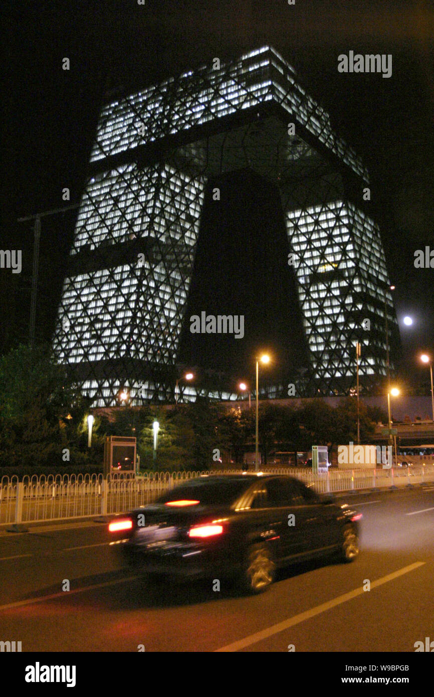 Night view of the new CCTV Tower during a trial lighting in Beijing ...