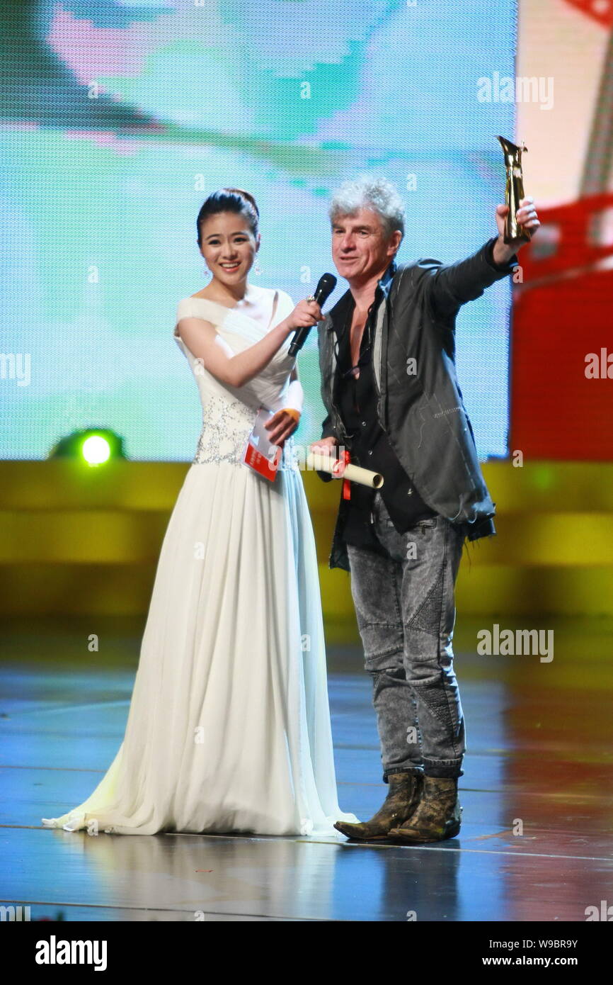 Australian cinematographer Christopher Doyle (R) speaks after being ...