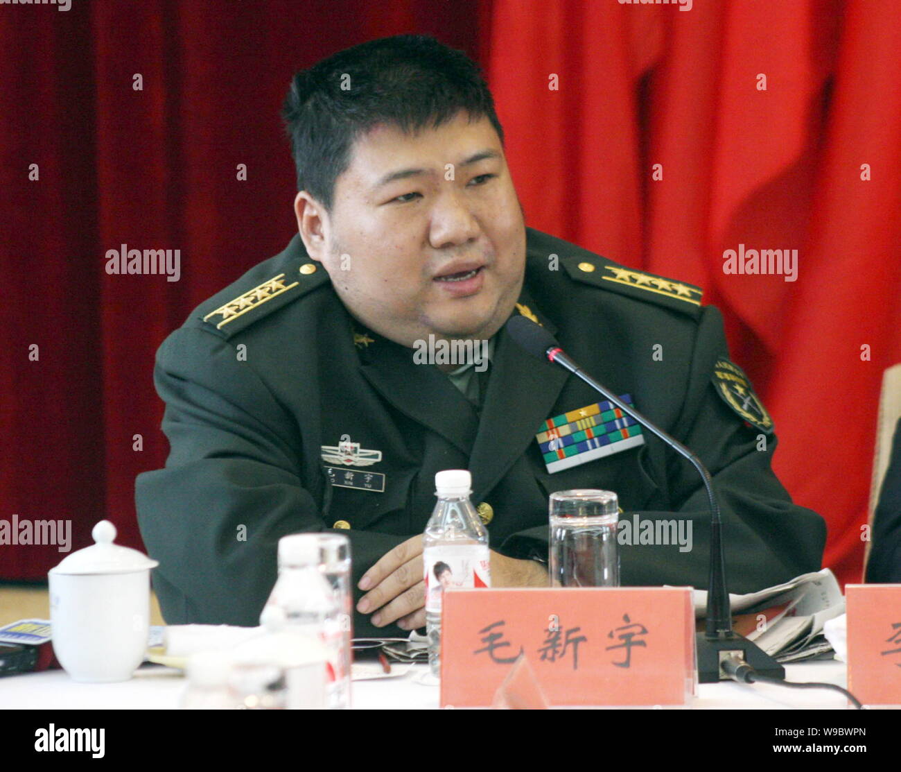 --FILE--Mao Xinyu, the grandson of Chairman Mao Zedong, speaks at a ...