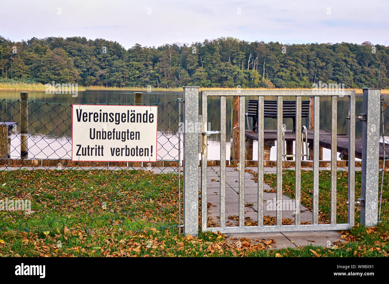 Pier for boats. Letters with Vereinsgelände Unbefugten Zutritt verboten ...