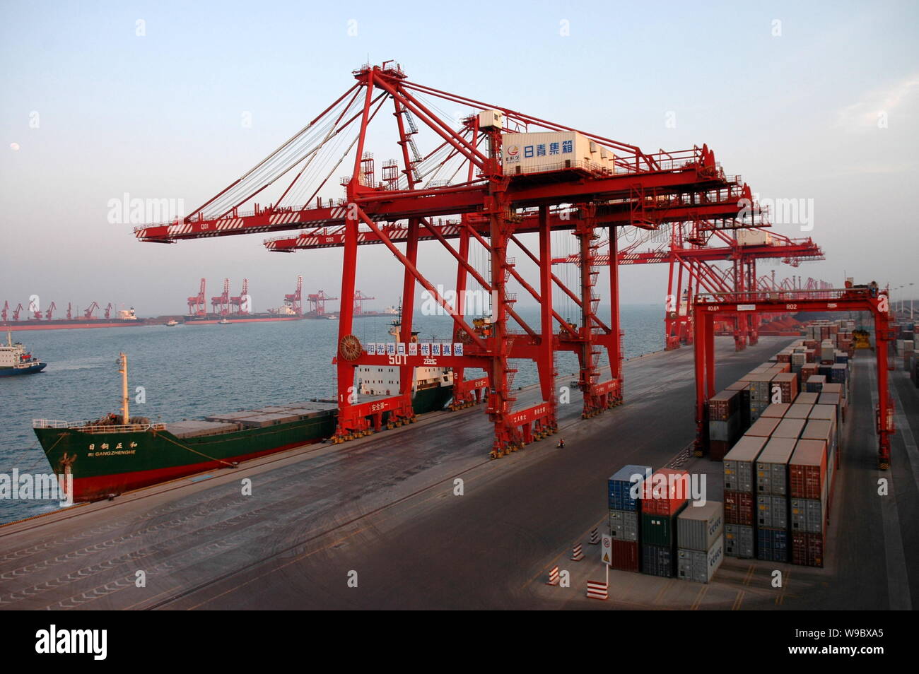--FILE-- Containers and cranes are seen at a container terminal in the ...