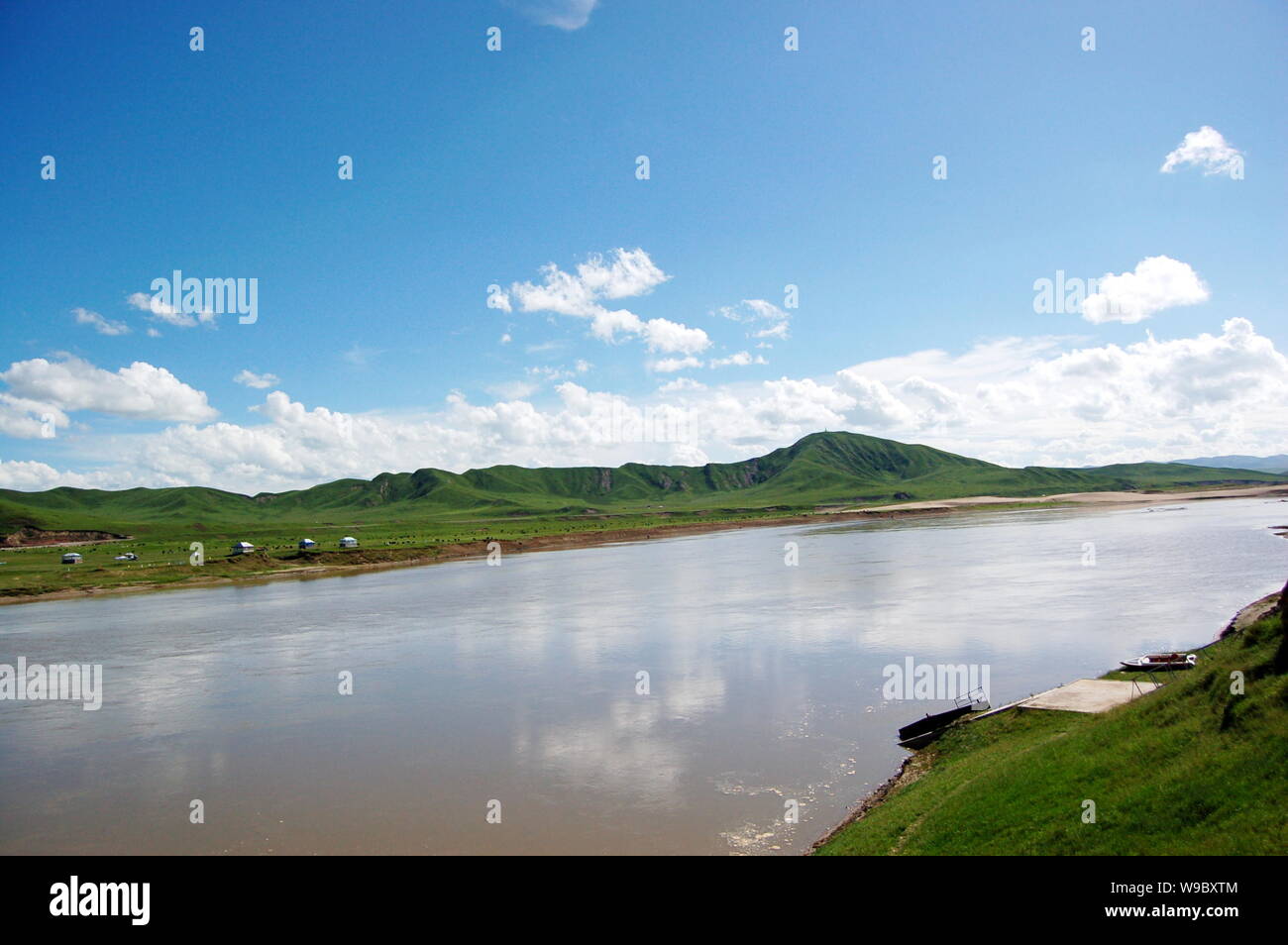 --FILE--The Yellow River water flows past the marshland in Maqu county ...