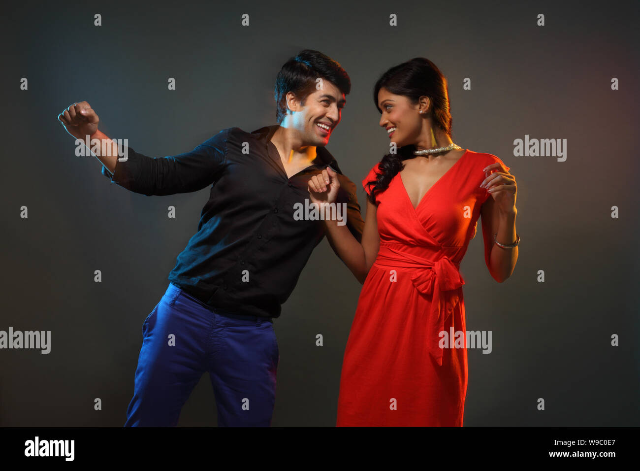 Young couple dancing Stock Photo - Alamy