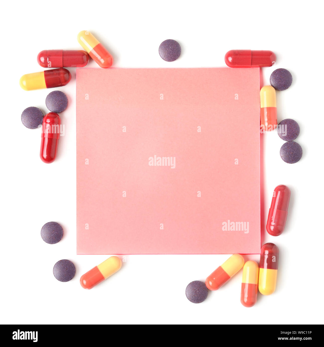 Colorful pills and paper for notes isolated on white Stock Photo - Alamy