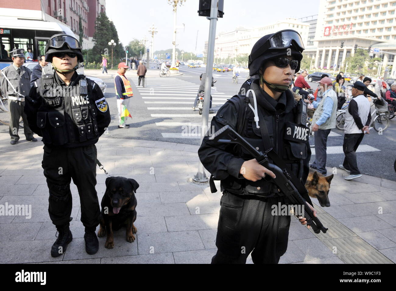 Chinese special policemen and their police dogs patrol the ChangAn ...