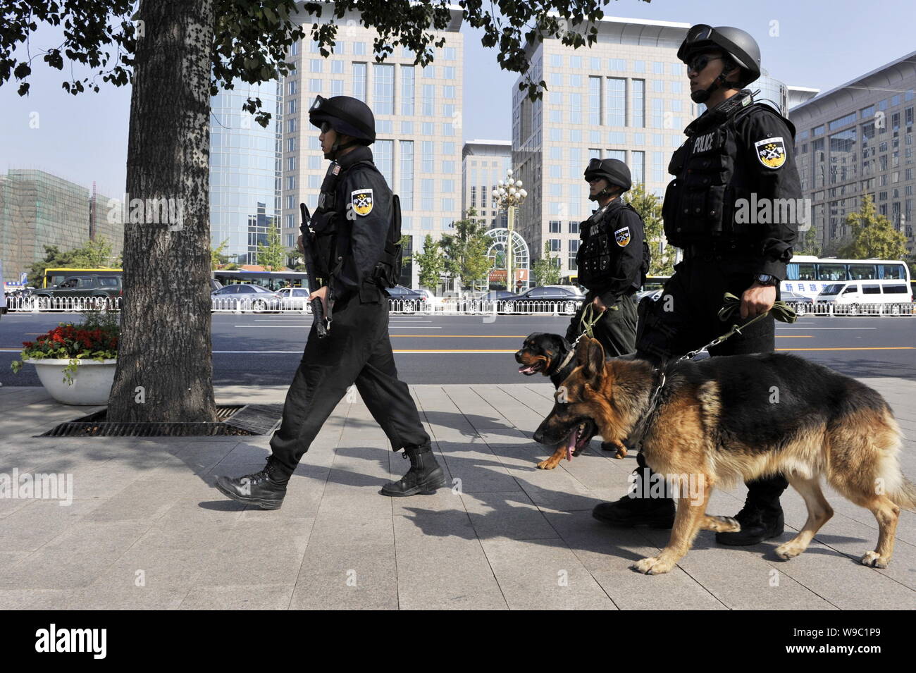 Chinese special policemen and their police dogs patrol the ChangAn ...