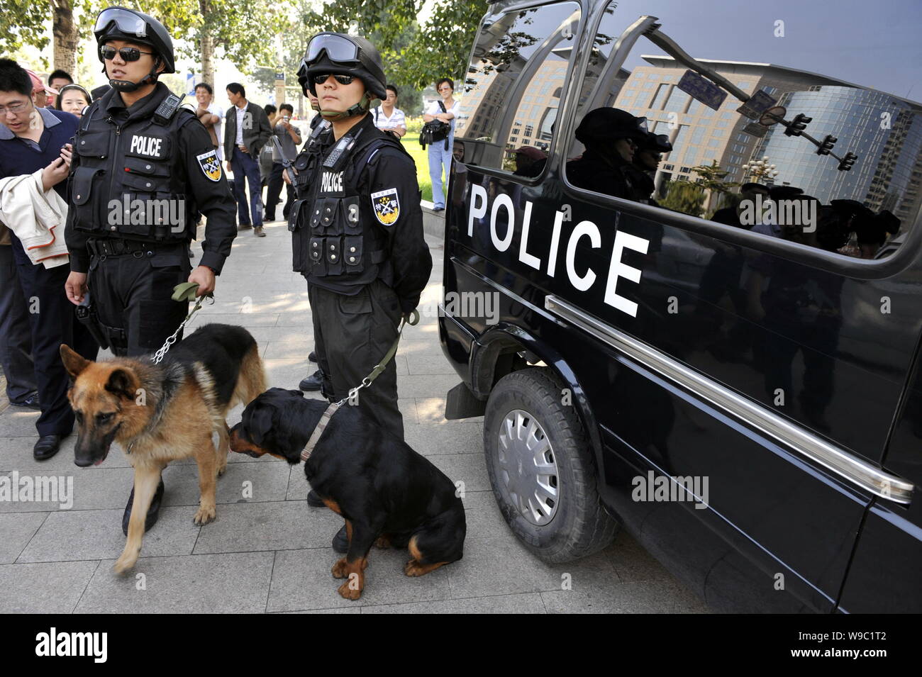 Chinese special policemen and their police dogs patrol the ChangAn ...