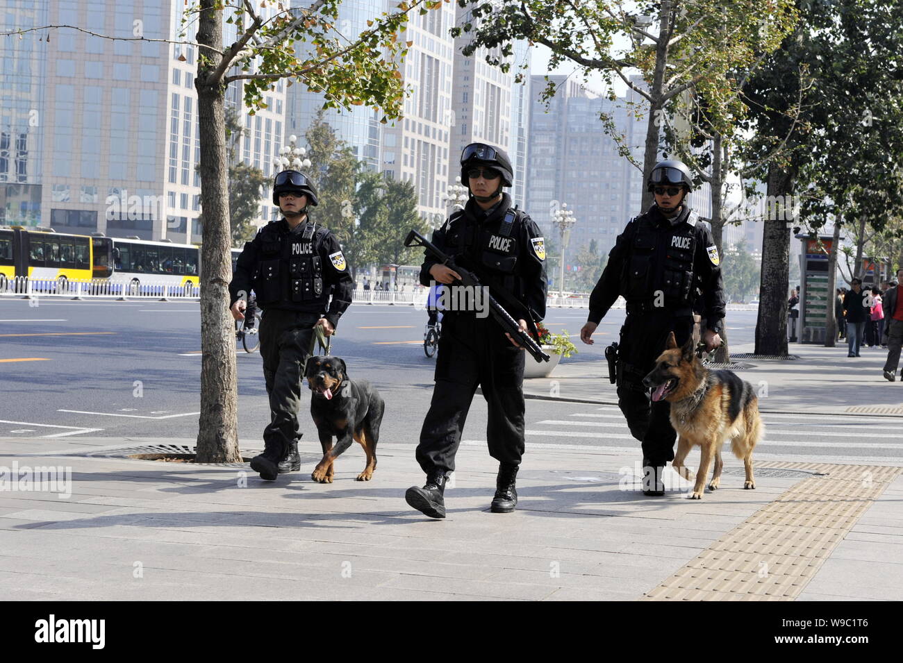 Chinese special policemen and their police dogs patrol the ChangAn ...