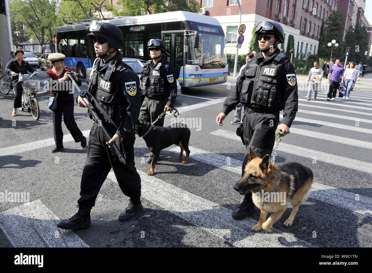 Chinese special policemen and their police dogs patrol the ChangAn ...