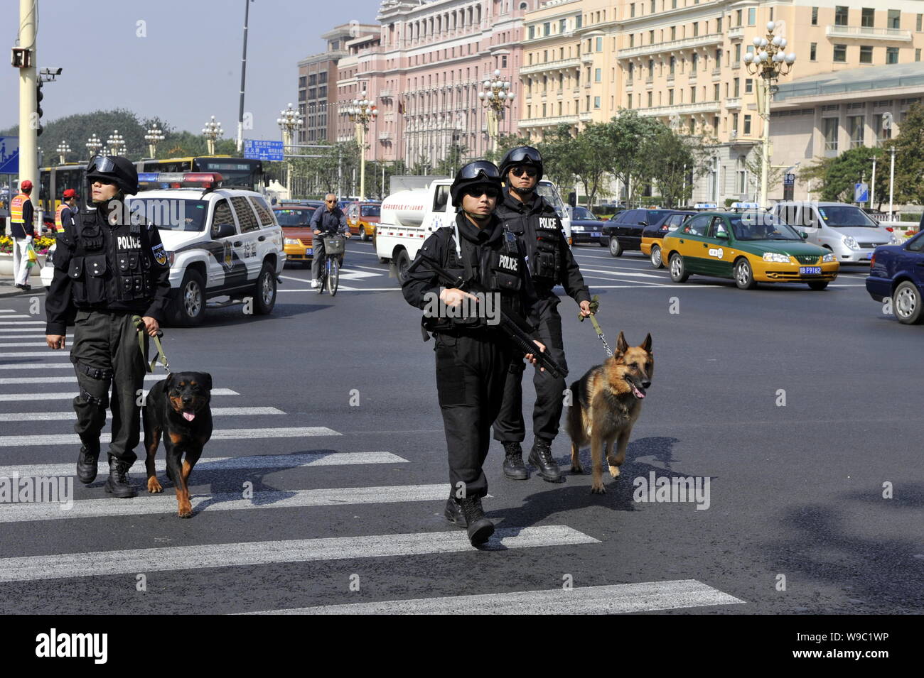 Chinese special policemen and their police dogs patrol the ChangAn ...