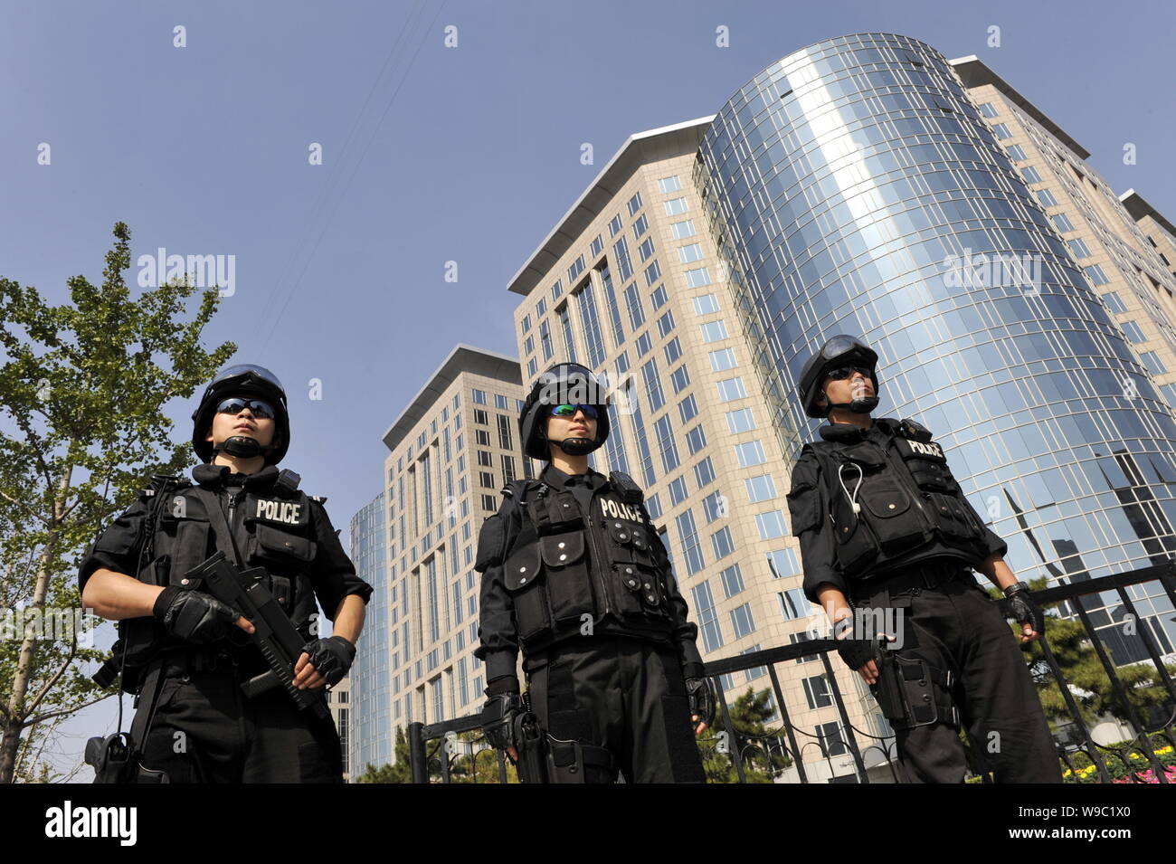 Police stand guard near hi-res stock photography and images - Alamy