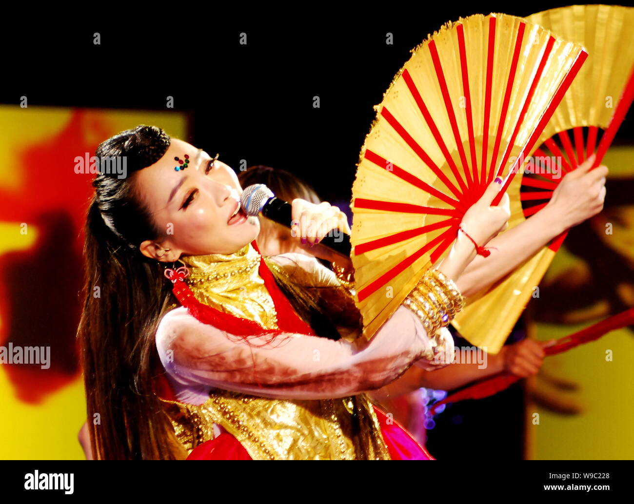 Chinese singer Sa Dingding performs during an event marking the third ...