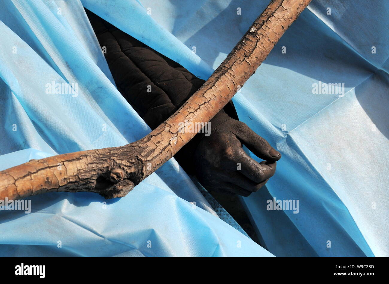 The hand of a dead miner is seen at the Tunlan coal mine where 74 ...