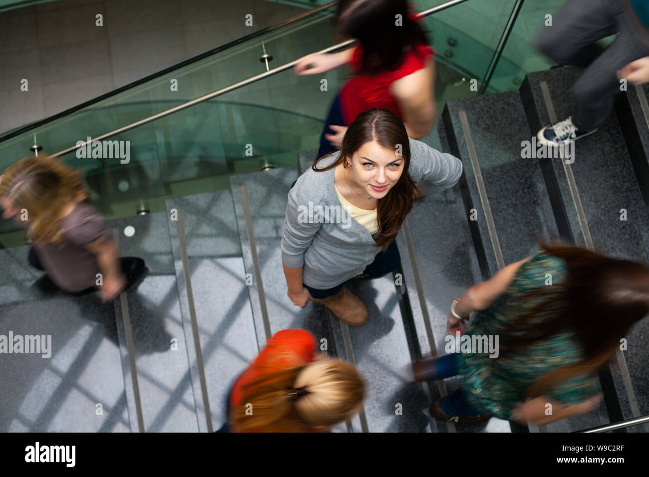 At the university/college - Students rushing up and down a busy ...