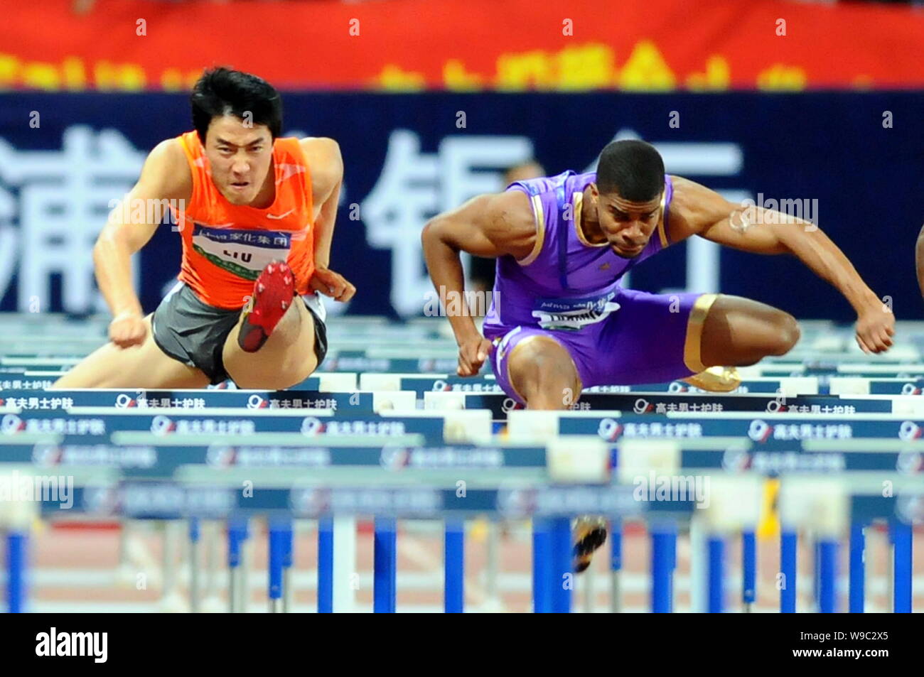 Chinas Liu Xiang, left, and Terrence Trammell of U.S. compete during ...