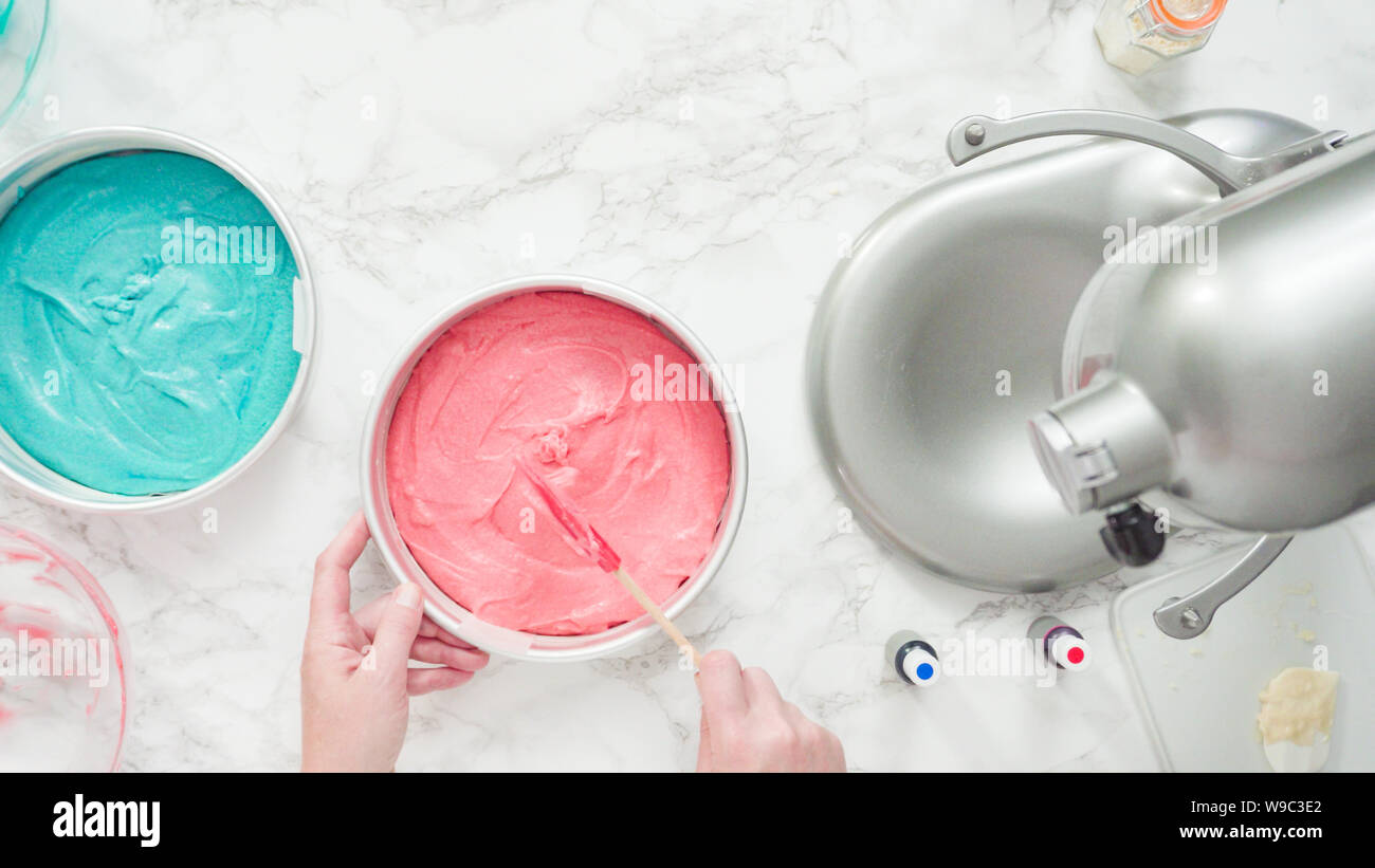 Step by step. Flat lay. Mixing food coloring into a cake batter to bake ...