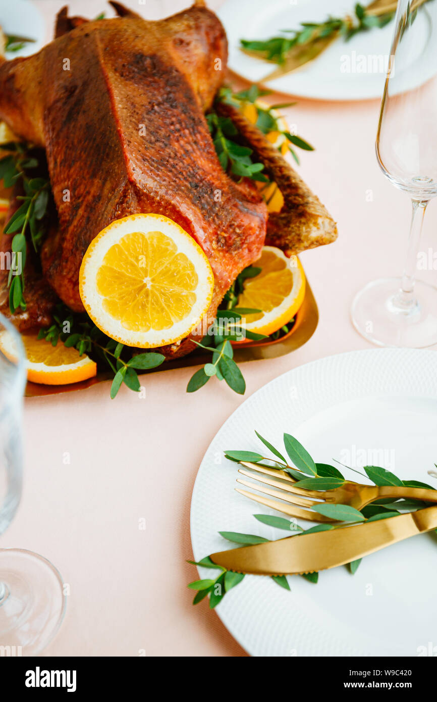 Roasted goose with oranges on a golden tray for celebrate event ...