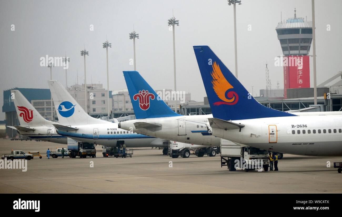 --FILE--Airplanes of Chinese airlines are seen at the parking apron of ...
