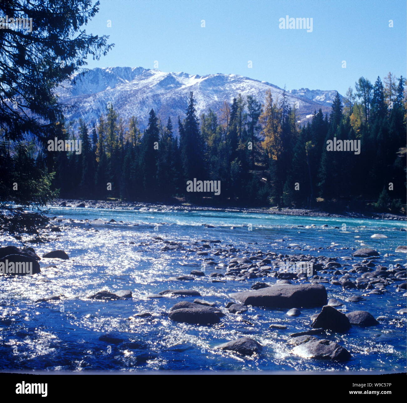 Landscape of river, trees and snow mountains in Tashkurgan Tajik ...