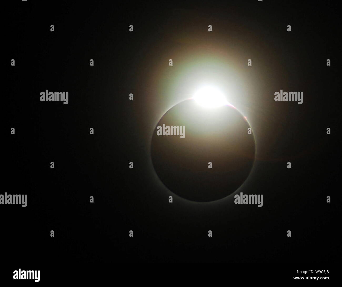 The Bailys bead of a total solar eclipse is seen in Chongqing, China ...