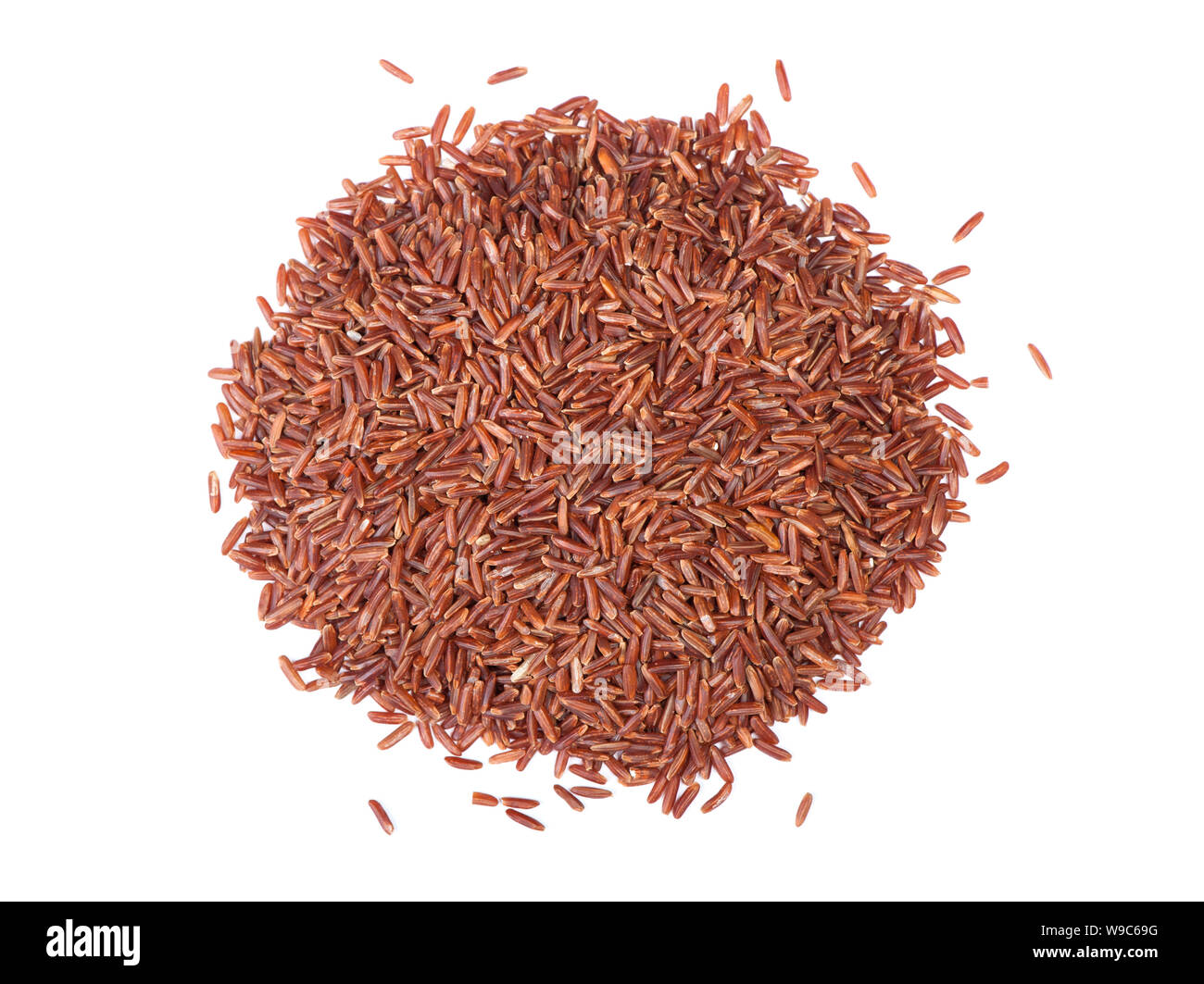 Heap of raw dry brown rice isolated on white background Stock Photo - Alamy