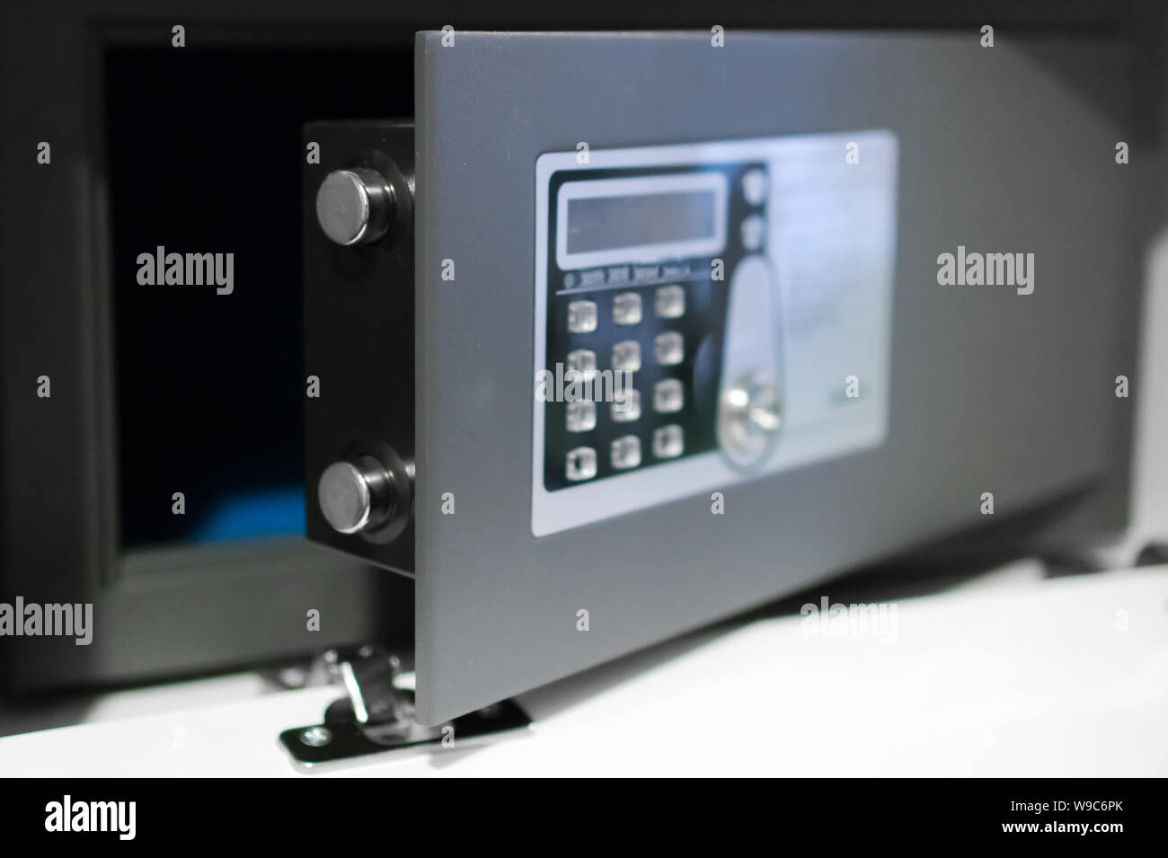 Black small home or hotel safe with keypad Stock Photo - Alamy