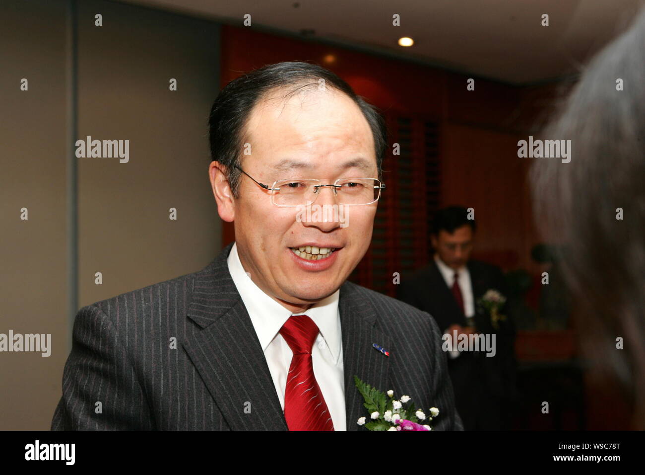 Xi Guohua, President of China CNR Corporation, is interviewed after a ...