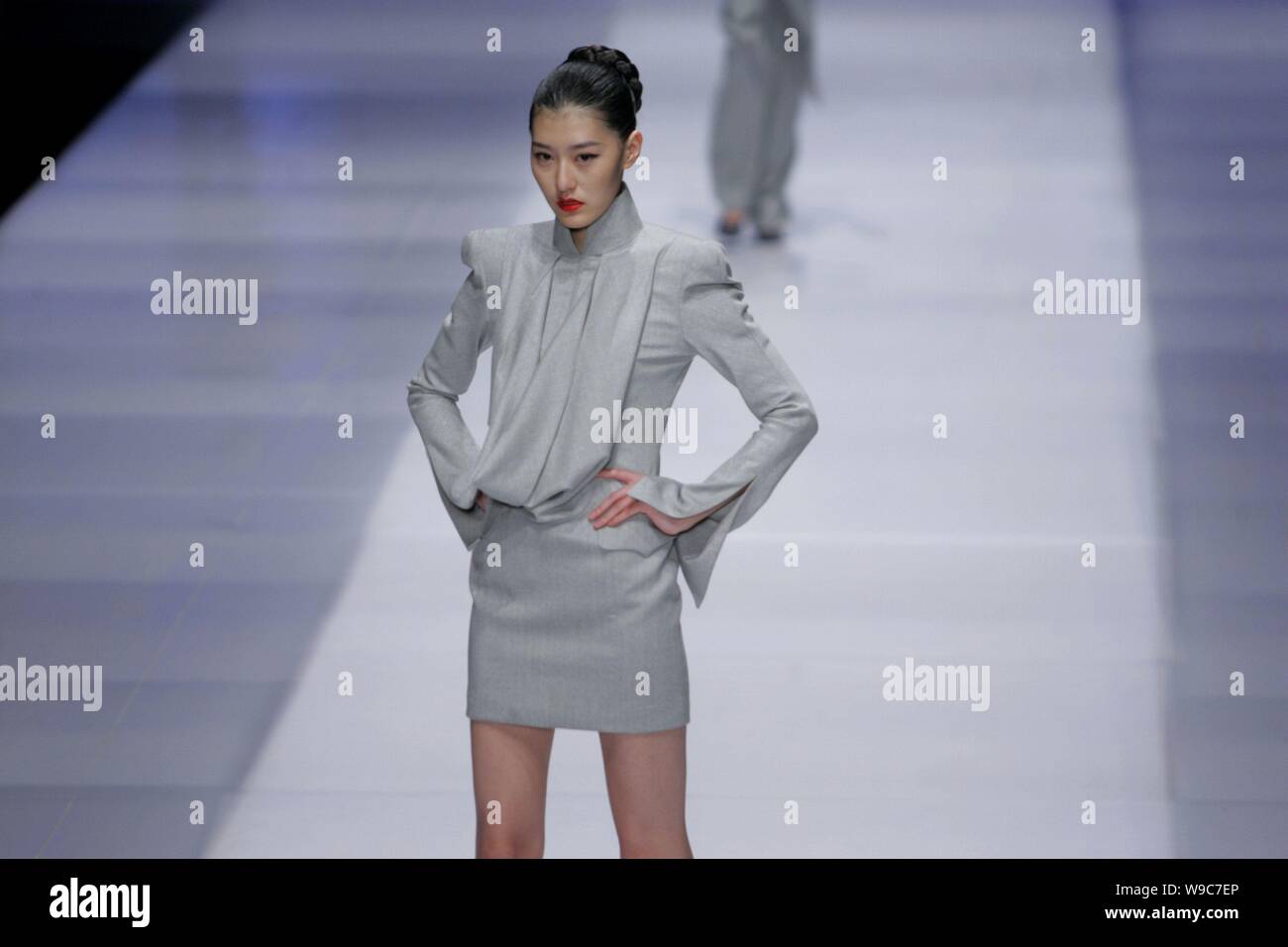 A Chinese model parades at the Chinese Tunic Suit (Zhongshan Suit ...