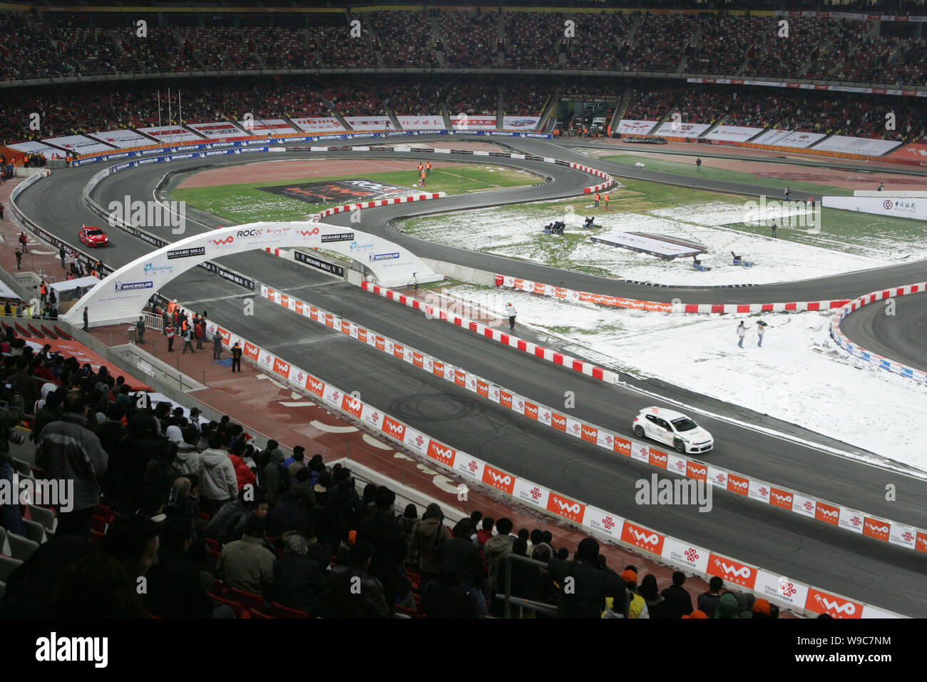 Two Chinese drivers compete during the the qualifying match of the Race ...