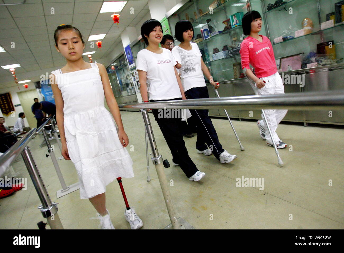 --FILE--Chinese girls who lost their legs in the May 12 earthquake and ...