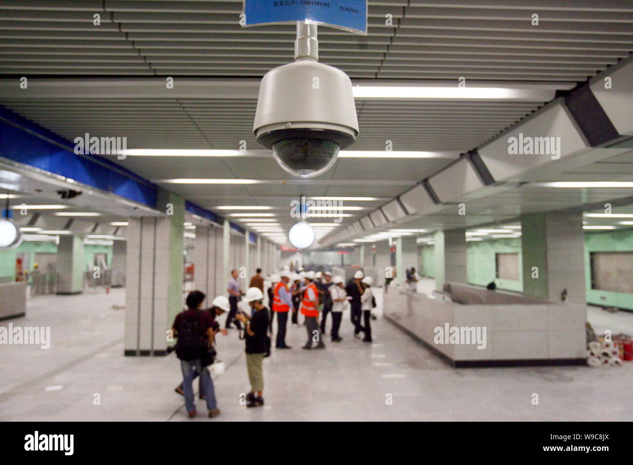 A surveillance camera is seen at a subway station of the Beijing Metro ...