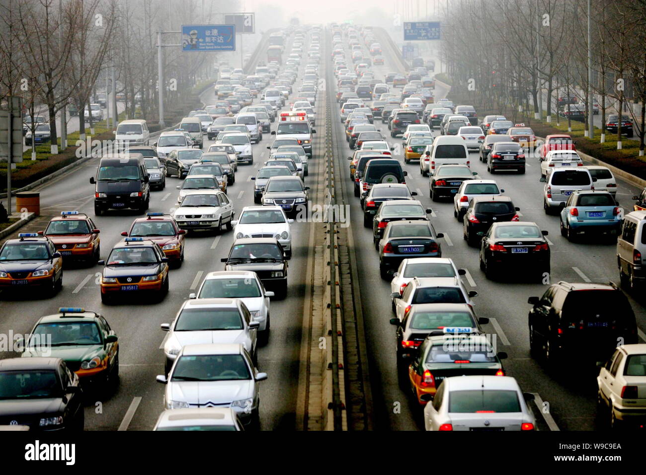 Masses of cars are seen driving on a street in Beijing, China, 21 ...