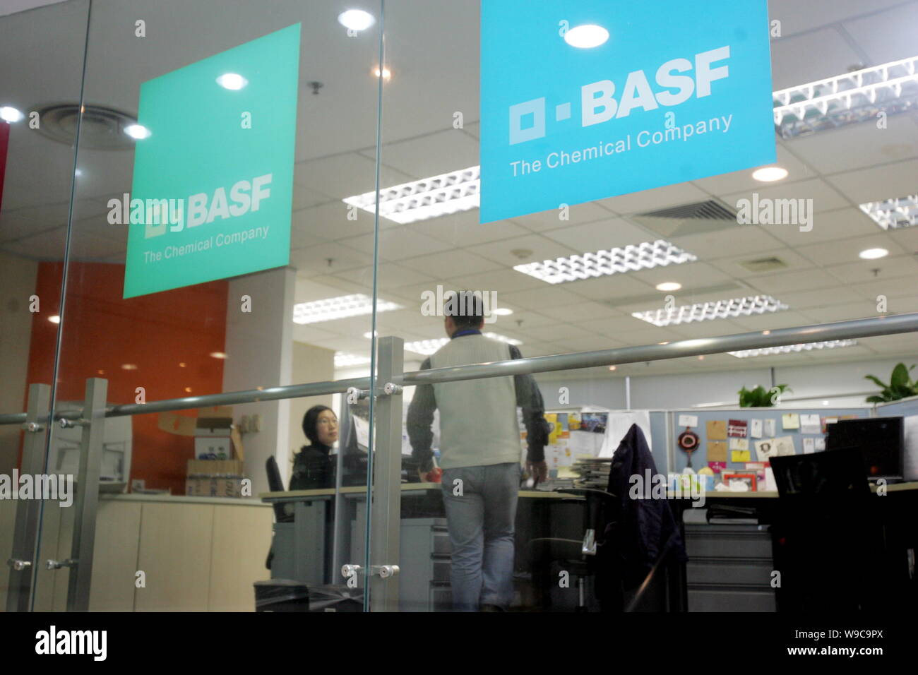 --FILE--Chinese employees are seen at the BASF Shanghai office in ...