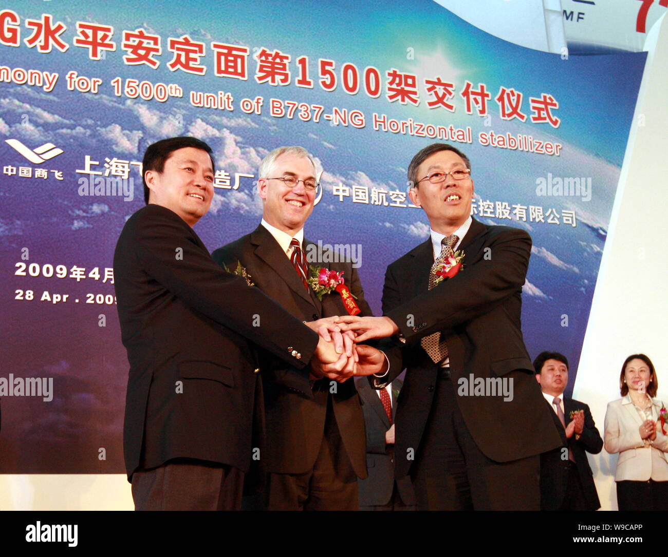 (From left) He Dongfeng, Vice President of Commercial Aircraft ...