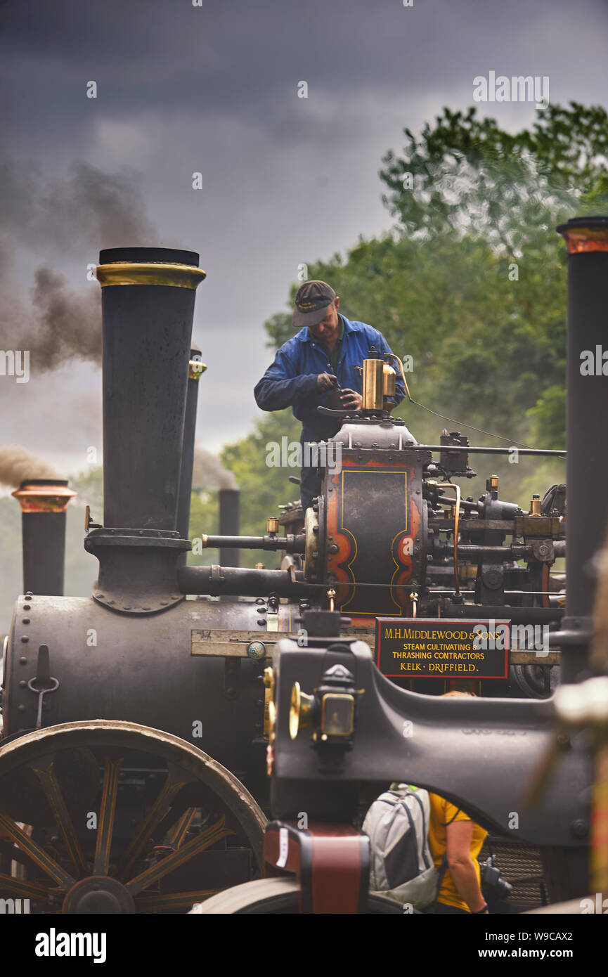 Men working on a traction engine at the Driffield Steam Rally Stock ...