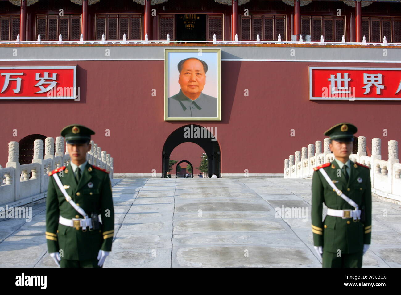 Chinese paramilitary policemen stand guard in front of the Tiananmen ...