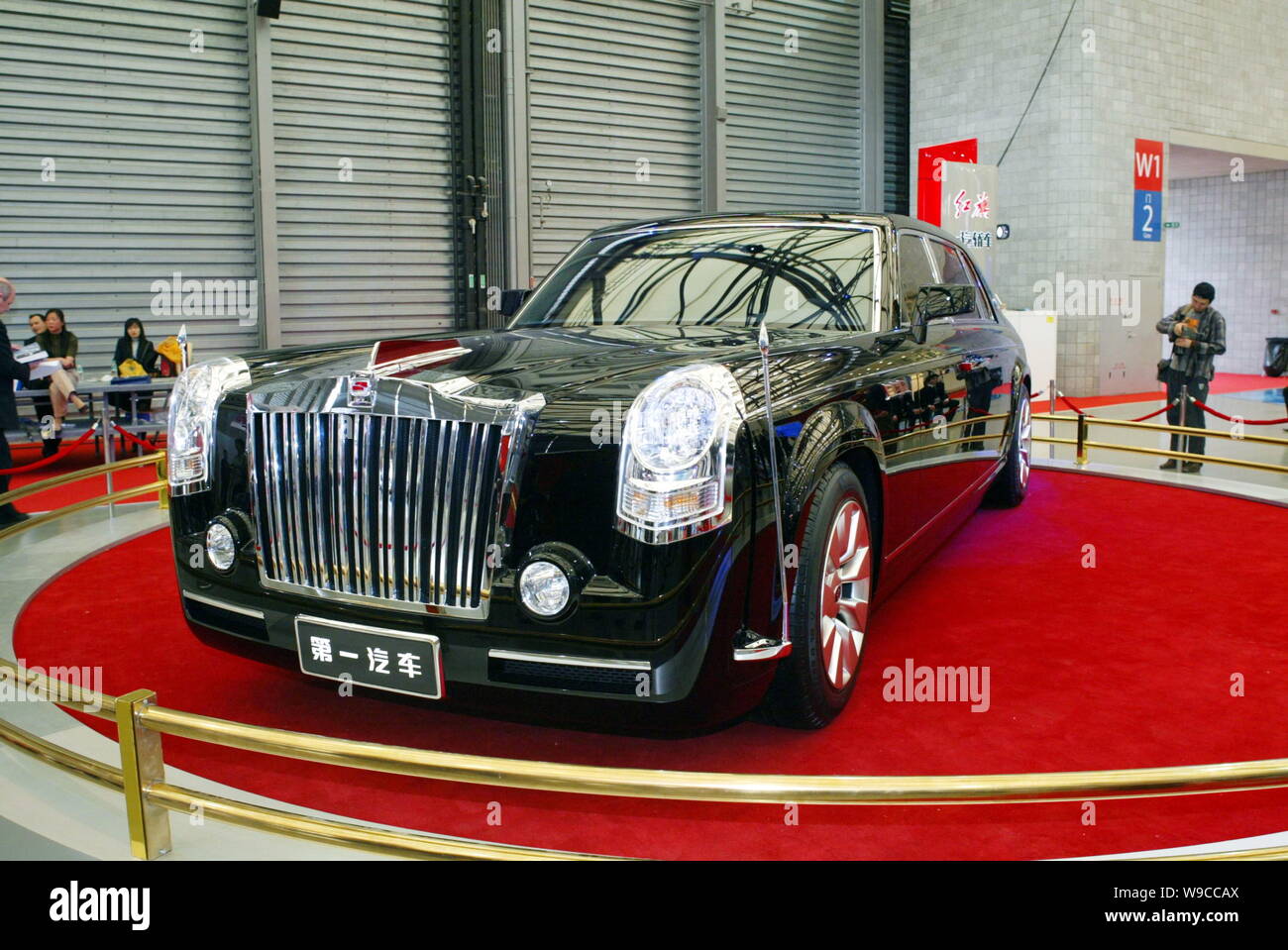 --FILE--Visitors look at a Hongqi (Red Flag) HQD concept car (currently ...