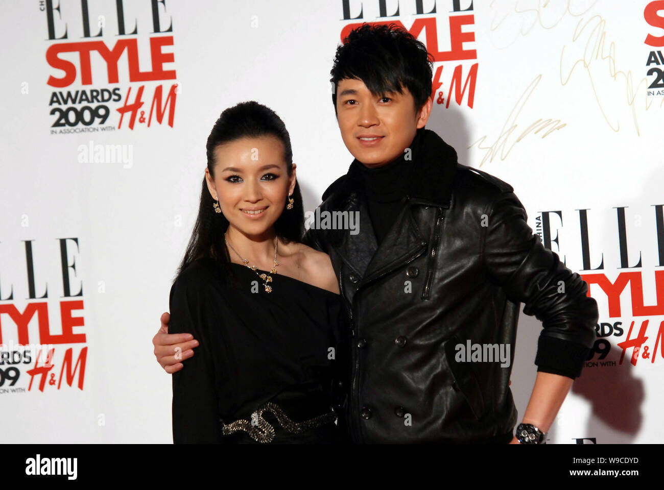 Chinese actress Dong Jie and her actor husband Pan Yueming are seen at ...