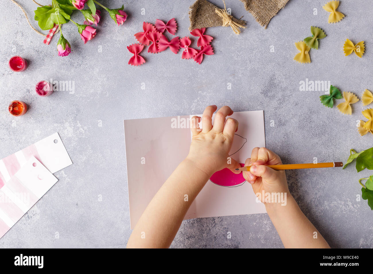 Paper crafts for mother day, 8 march or birthday. Small child doing a ...