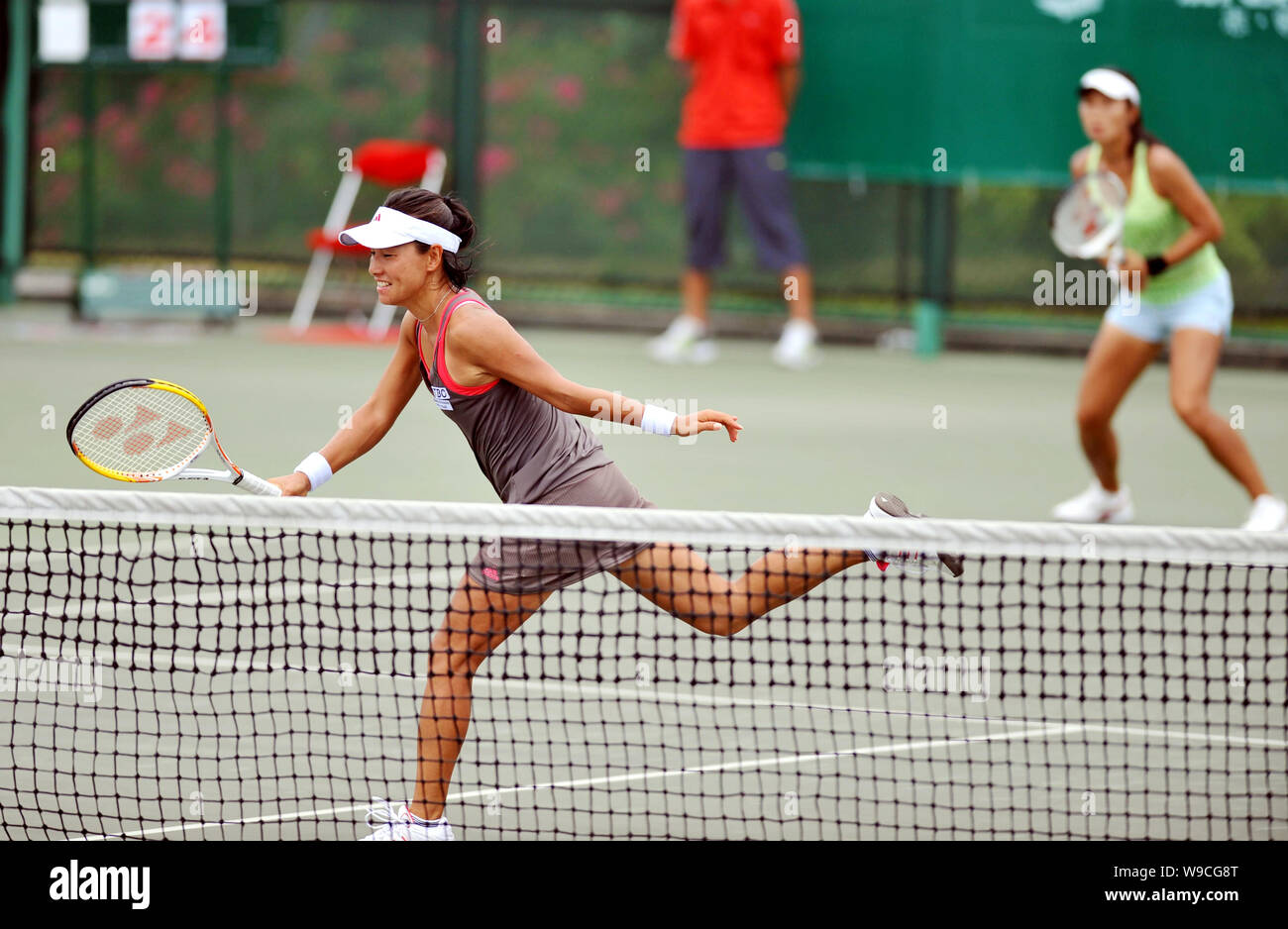 Kimiko Date Krumm of Japan, left, and Chinas Sun Tiantian compete ...