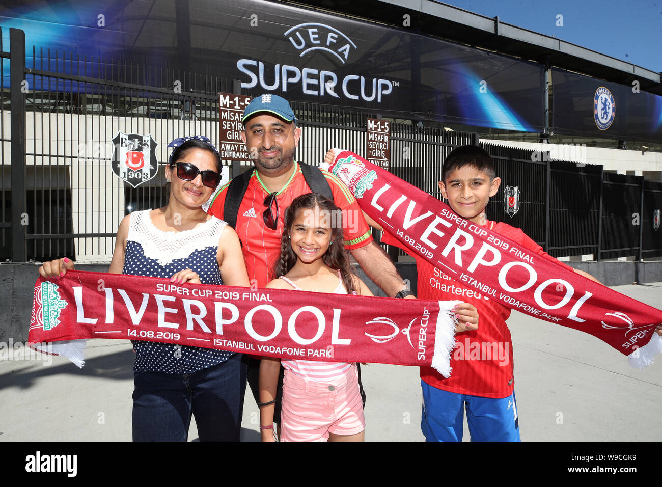Liverpool fans pose for a photo outside Besiktas Park, Istanbul Stock ...