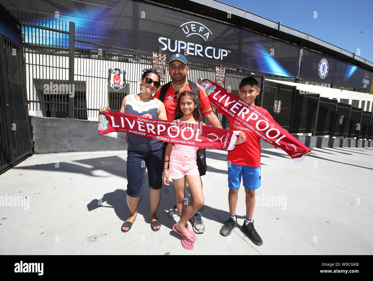Liverpool fans pose for a photo outside Besiktas Park, Istanbul Stock ...