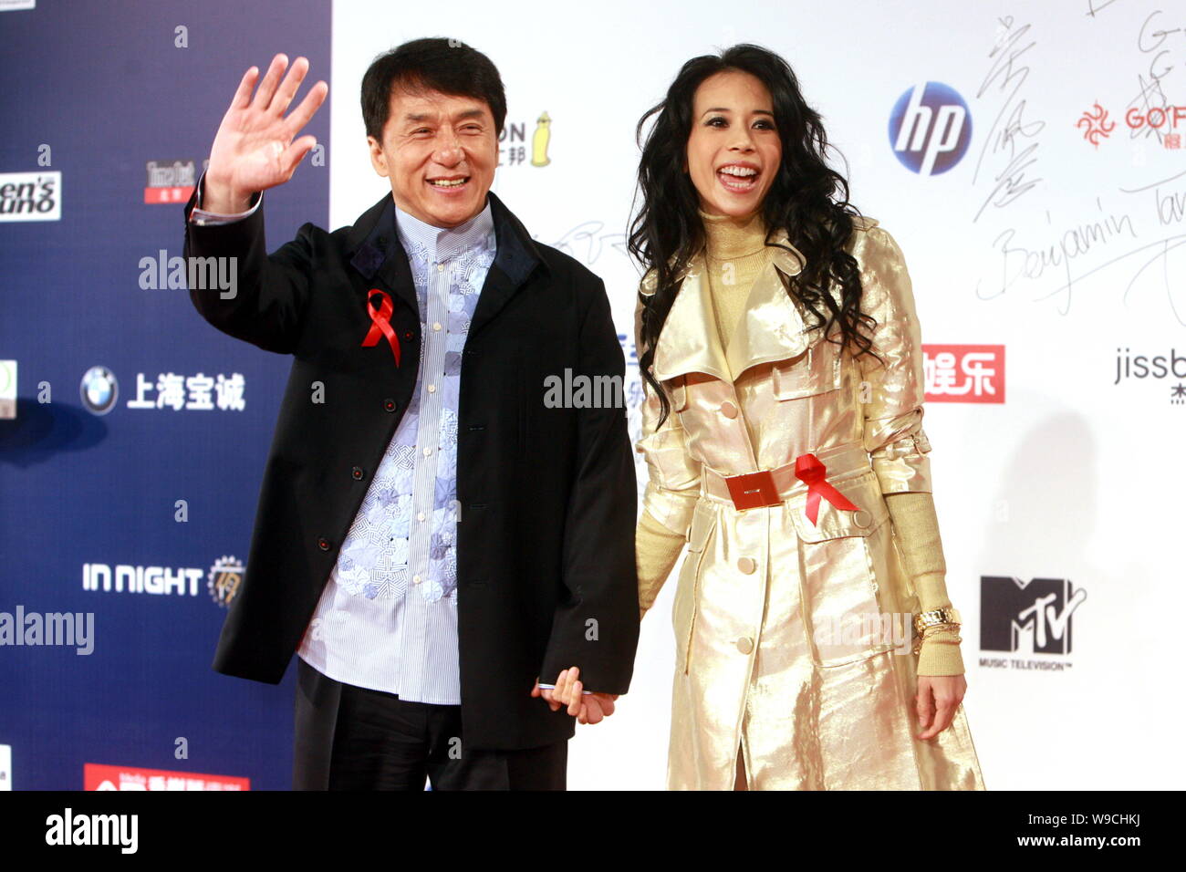 Hong Kong kungfu superstar Jackie Chan, left, and Hong Kong singer and ...