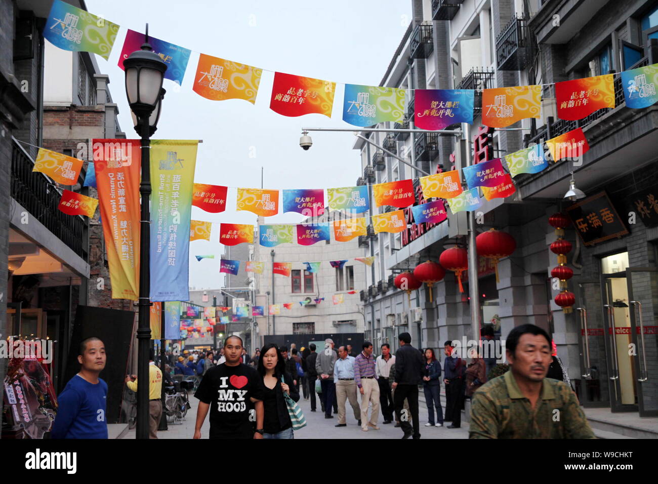 Tourists walk along the Dazhalan Xijie, known as the West Dashilan ...