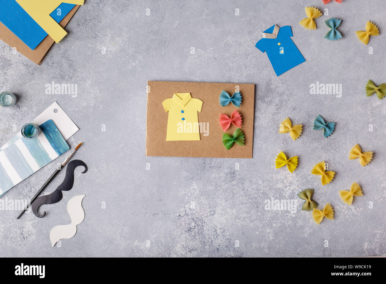 Making greeting card for Fathers Day. Shirt with butterfly from pasta ...